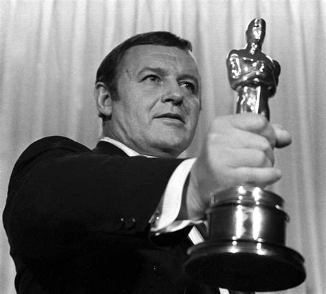 Download Rod Steiger Holding Oscar Award In 1968 Wallpaper Wallpapers Com