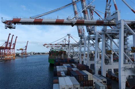 The Container Vessel During Loading At An Industrial Port By Port Crane Neural Network Ai