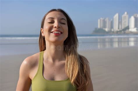 Fitness Girl Takes A Break And Relax Breathing After Running On The