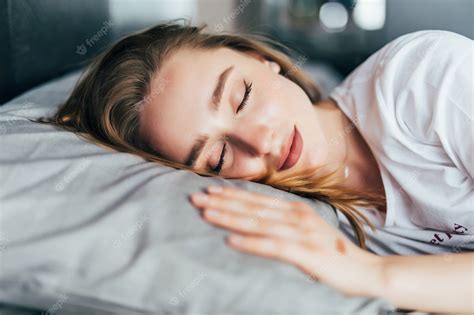 Premium Photo Woman Sleeping On The Bed