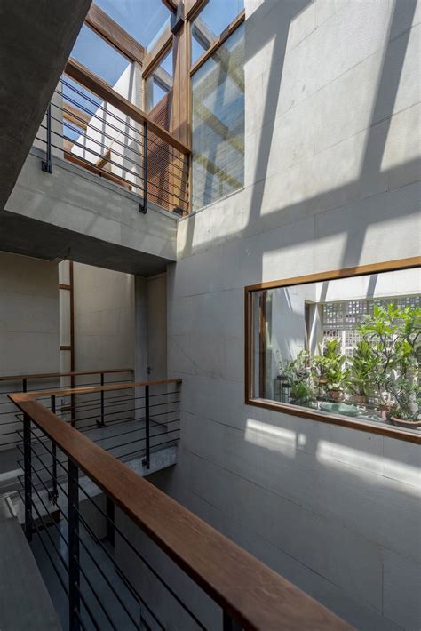 Malik Architecture Punctures House In Delhi With Multi Storey Voids