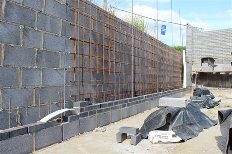 Blocks Are Flying Up Fast Towards Completing The Retaining Wall Self Build Blog