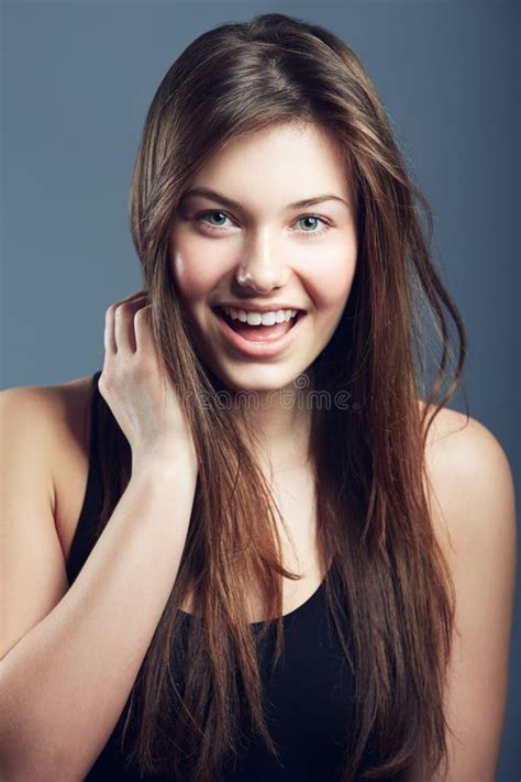 Shes A Natural Beauty Studio Shot Of A Beautiful Young Woman With Long