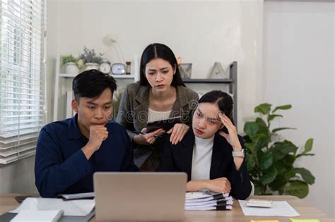 Problem Solving And Team Dynamics Team Members Focused On Addressing Challenges While Analyzing