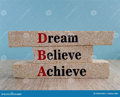 Dream Believe Achieve Symbol Dba Acronym On Brick Blocks With Letters Beautiful Blue
