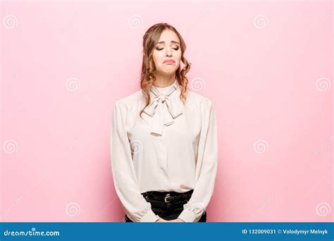Portrait Of Displeased Upset Female Frowns Face As Going To Cry Stock