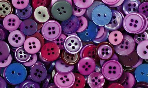 Premium Photo A Purple Button With A Button On It