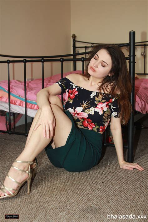 Sweet Chick Posing In Her New Outfit On The Floor Photos
