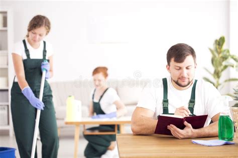 Man Checking To Do List Stock Photo Image Of Company