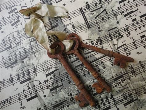 Trio Of Rusty Skeleton Keys Hung On Crinkly Distressed Seam Etsy Old Keys Rusty Key