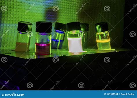 Multiple Colourful Light Induced Catalyst Photochemical Reaction Side View In Glass Vial Under