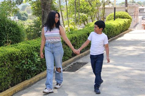 16 Year Old Sister Takes Care Of Her 10 Year Old Dark Skinned Latino Brother In The Park Alone