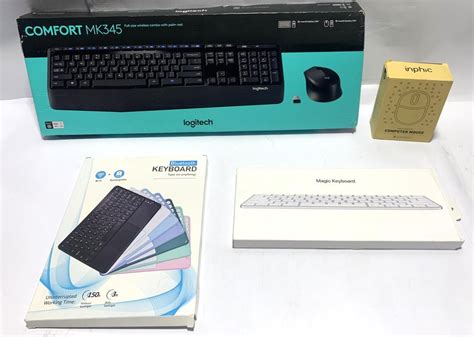 At Auction A Group Of Keyboards And Mouses Untested