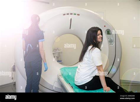 Doctor Doing Computed Tomography For Female Patient Stock Photo Medicine Diagnostic Concept