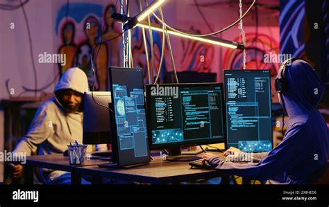 Hackers In Secret Bunker With Graffiti Walls Writing Code That Spoofs Their Location Tricking