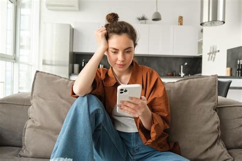 Premium Photo Portrait Of Young Modern Woman Reading On Mobile Phone Scrolling Social Media