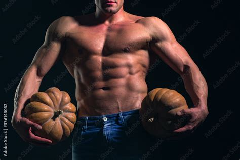 Sexy Halloween Man Holding Pumpkin Muscular Athletic Sexy Male With