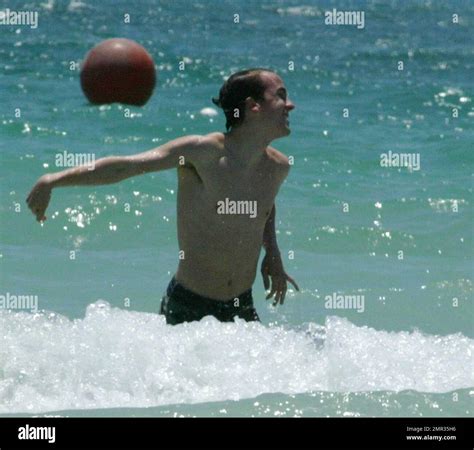 Frankie Muniz And Fiancee Jamie Gandy On Miami Beach Frankie Played In The Surf Before Walking
