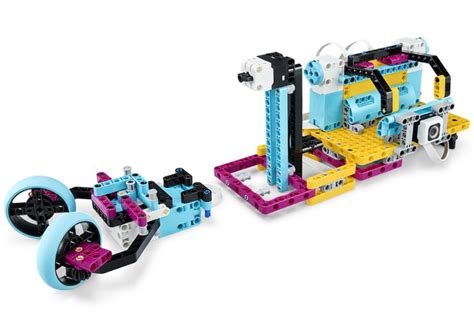 Two Legos That Are Sitting Next To Each Other On A White Surface And