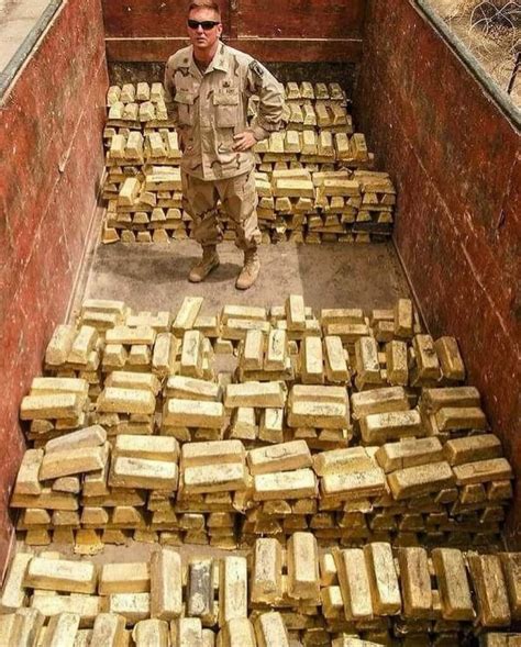 Rare 2003 Photograph Reveals U S Soldier Guarding Gold Bars Recovered