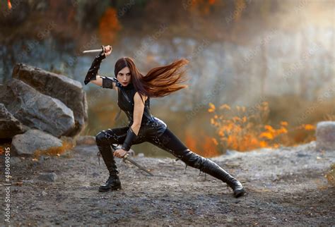 Fantasy Fighting Woman Assassin Actions In Motion Battle Hold Daggers