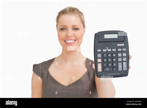 Woman Showing A Calculator In Her Hand Stock Photo Alamy