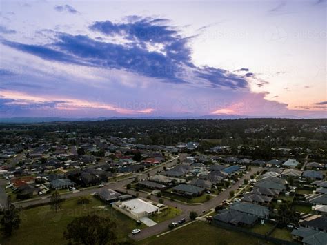 Image Of Deep Purple Sunset Sky Over Houses Of Singleton In Nsw