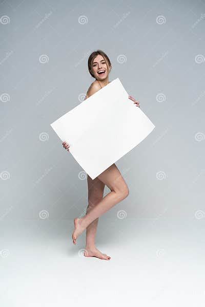Naked Girl With A Poster Clean Skin Hair Removed Isolate For