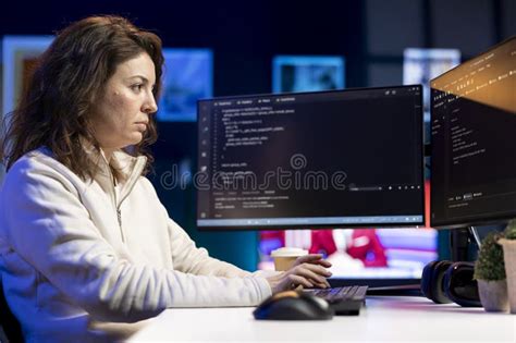 System Administrator Fixing Vulnerabilities In Software Stock Image