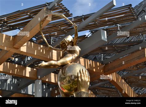 Gilded Bronze Sculpture Of Young Naked Gymnast Above Globe With