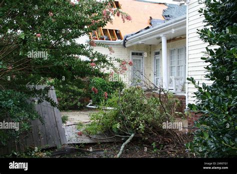 Parts Of The Roofing Of Genesis Coopers Home Flaps In The Wind After A