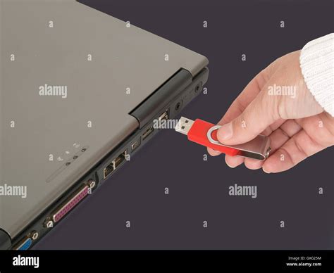 Inserting Memory Stick Stock Photo Alamy