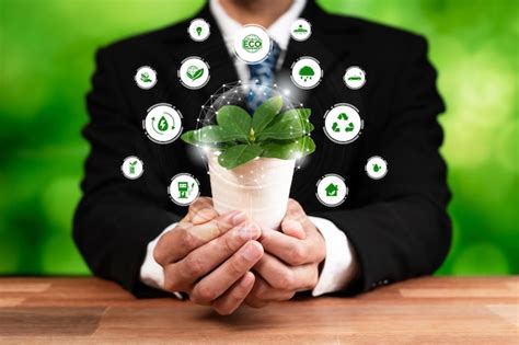 Premium Photo Businessman Holding Green Plant With Eco Digital Design