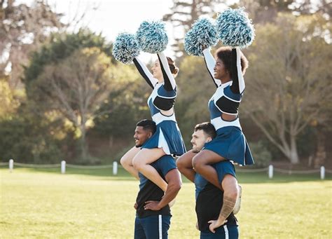 Premium Photo Cheerleader Sports And Men Carry Women On Field For Performance Dance And