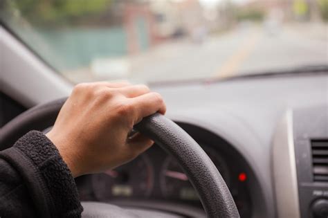 Premium Photo Car Driving Handle With Hand A Symbol Of Control Independence Mobility And The