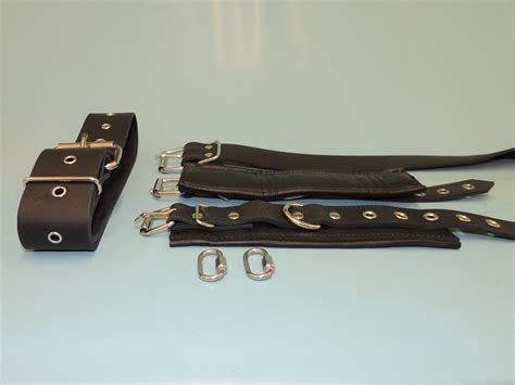 Padded Leather Wrist To Thigh Restraint Set Sinners Uk Padded Leather Wrist To Thigh Restraint Set Sinners Uk