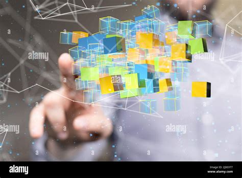 Businessman Tapping On A Digital Render Of A Floating Connected Cube