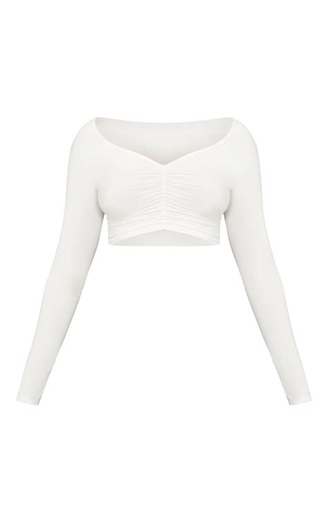 Cream Slinky Ruched Front Long Sleeve Crop Top Tops Prettylittlething Ire