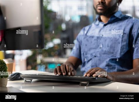 Data Scientist Typing On Keyboard Creating Machine Learning Models