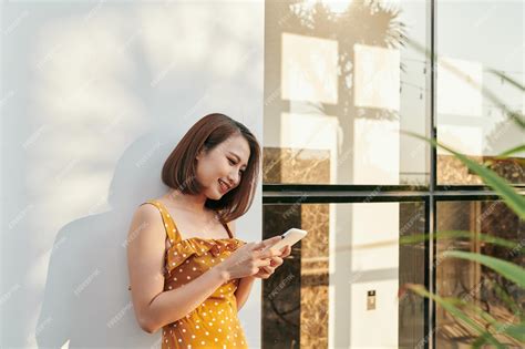 Premium Photo Portrait Of Young Smiling Fashion Girl Standing The