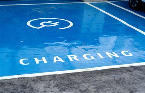 An Electric Vehicle Ev Charging Bay Marked With A Charging Symbol