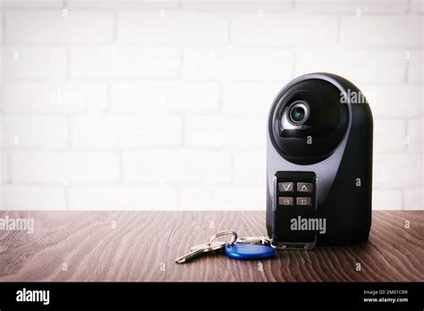 Wireless Ip Webcam With A Motion Detection And Keys For Home Access Safety And House Control