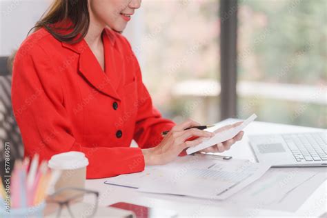 Female Attractive Asian Banker Accountant Wearing Red Formal Suit Calculate The Cash Bill Of