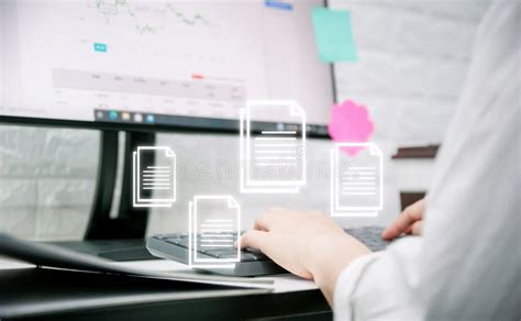 Business Developer Using Document On Laptop Computer Project Management A Concept Stock Image