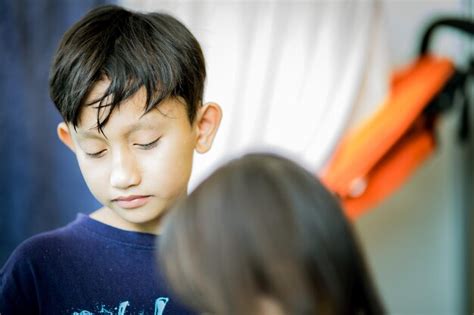 Premium Photo Close Up Of Siblings At Home