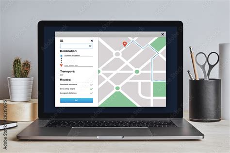 GPS Map Navigation App On Laptop Screen On Modern Desk Location Tracker Concept Front View