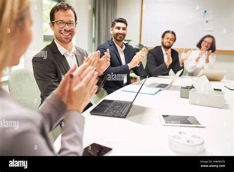 Group Of Business People Giving Applause And Clapping For Approval And