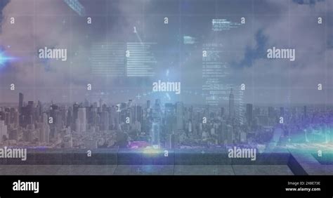 Image Of Statistical Data Processing And Light Spots Against Aerial View Of Cityscape Stock