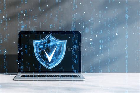 Digital Shield Icon On Laptop Screen With Binary Code Overlay Representing Cybersecurity On A