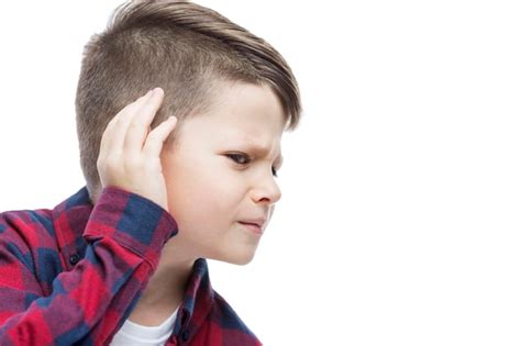 Premium Photo Eavesdropping Boy 56 Years Old In A Red Plaid Shirt